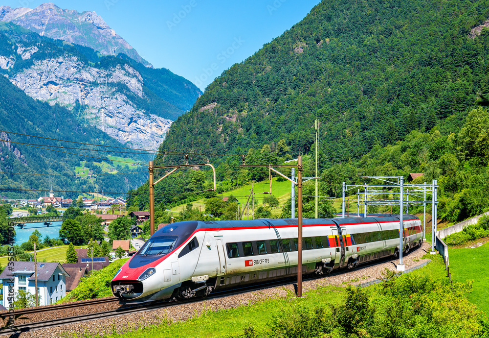 Alstom tilting high-speed train on the Gotthard railway Stock Photo ...
