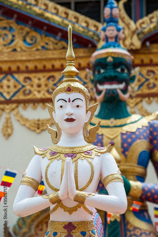 Statues of Devas by the Entrance of Wat Chayamangkalaram Buddhist ...