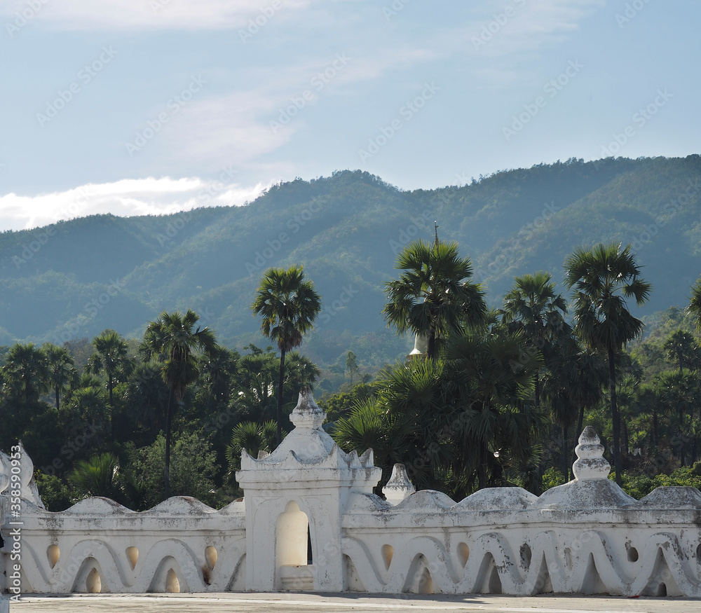 Mountain view with white wave fence of Hsinbyume pagoda, Min kun town ...