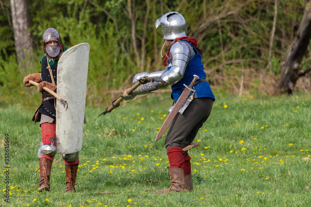 Details of the ancient uniform of knights in armor and helmets, the era ...