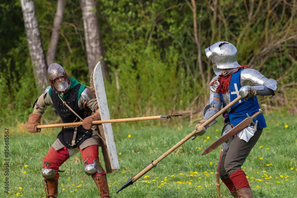 Details of the ancient uniform of knights in armor and helmets, the era ...