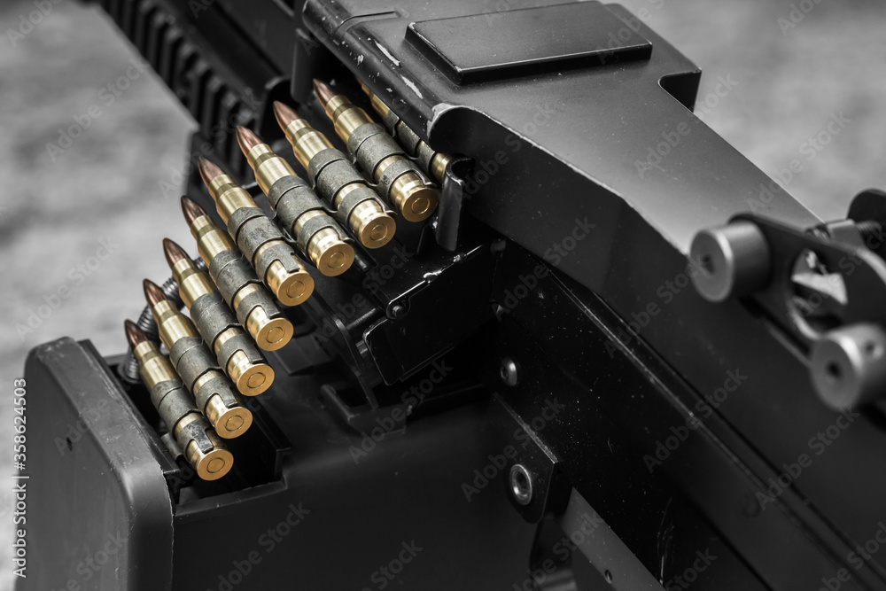 M249 light machine gun with 7.62 mm cartridge belt black and white ...