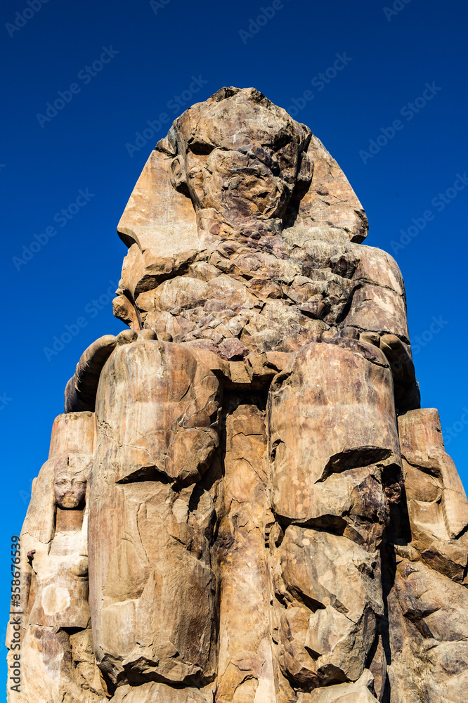 It's Closeup of the Colossus of Memnon, massive stone statue of Pharaoh ...