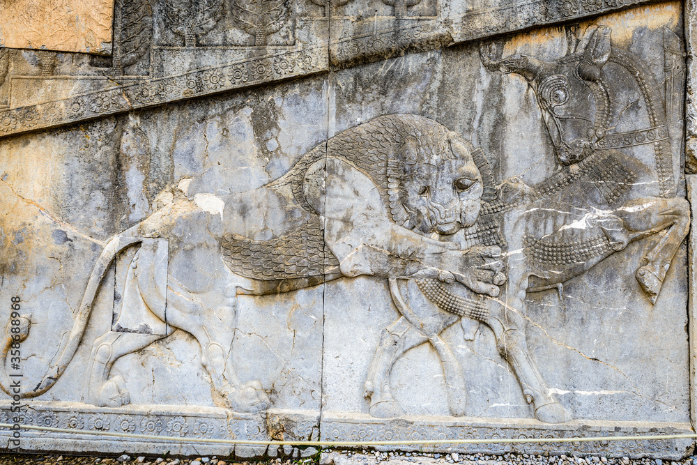 It's Relief of a lion biting antelope.Persepolis, the ceremonial ...