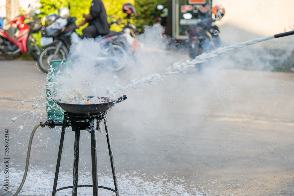 Fire fighters teach or training how to use fire extinguishers foam type ...