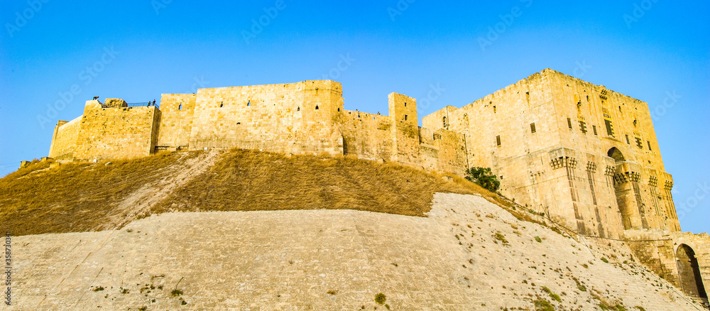 It's Citadel of Aleppo, a large medieval fortified palace in the centre ...