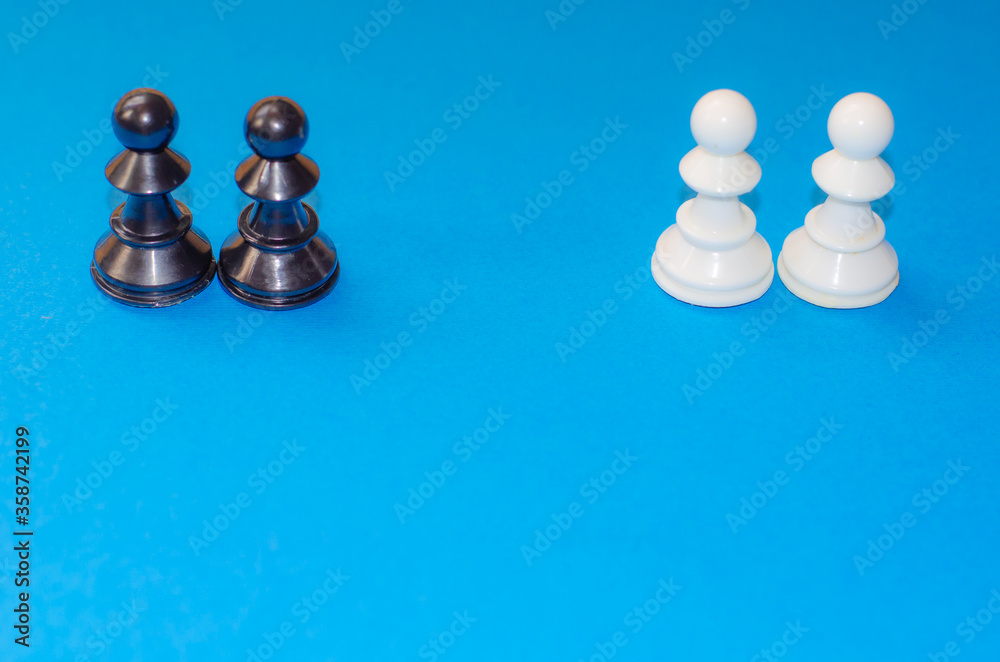 Black and white chess pieces on a blue background. Stop racism. Black ...