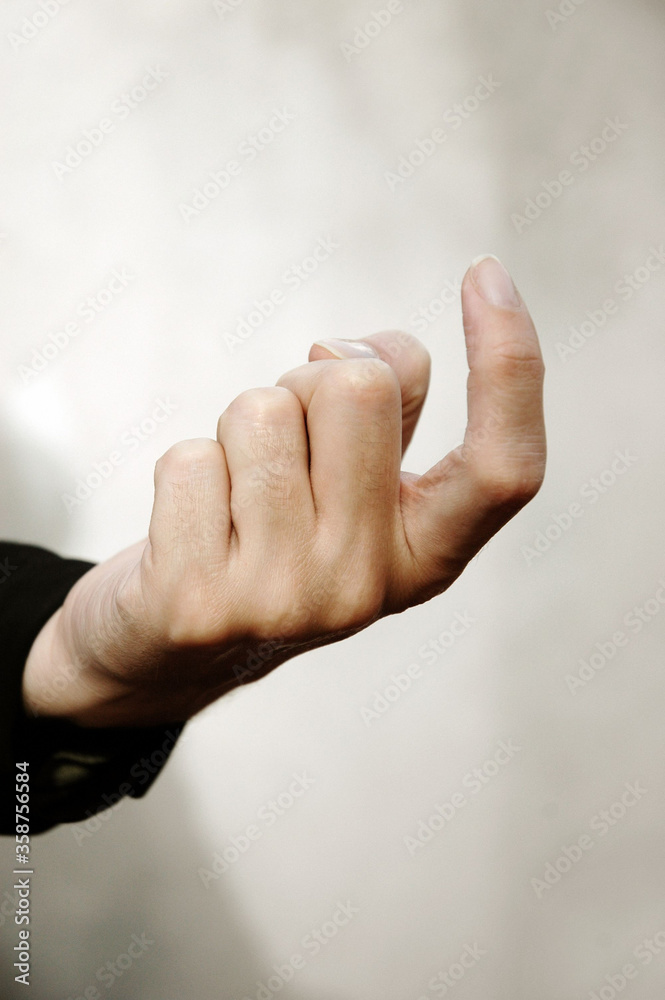 Hand Sign performing symbol language Stock Photo | Adobe Stock