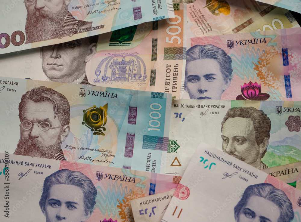 Money pattern from new Ukrainian banknote. Pile of New paper hryvnias ...