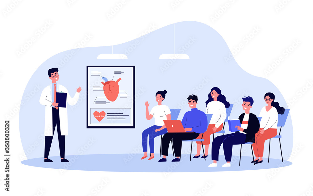 Medical college students listening to doctor lecture in classroom ...