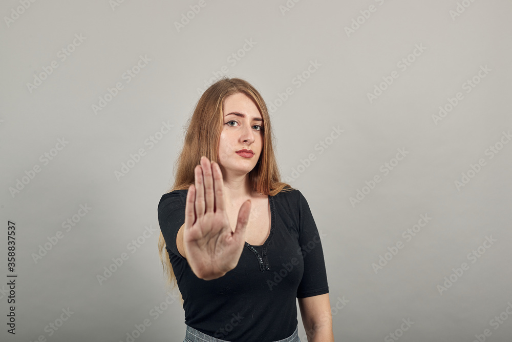 Palm arm raised air angry look straight you will not pass through ...