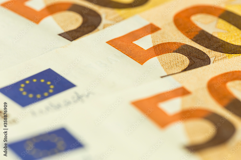 Macro detail of new overlapped fifty 50 euro banknote. Design elements ...