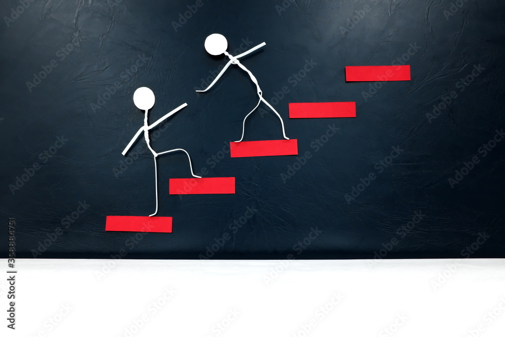 Helping hand, support and teamwork concept. Two human stick figures ...