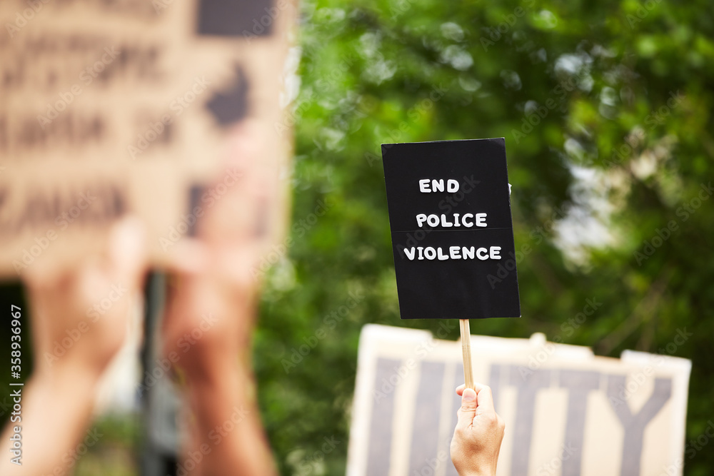 Sign at the freedom march in the city "end police violence", black sign ...