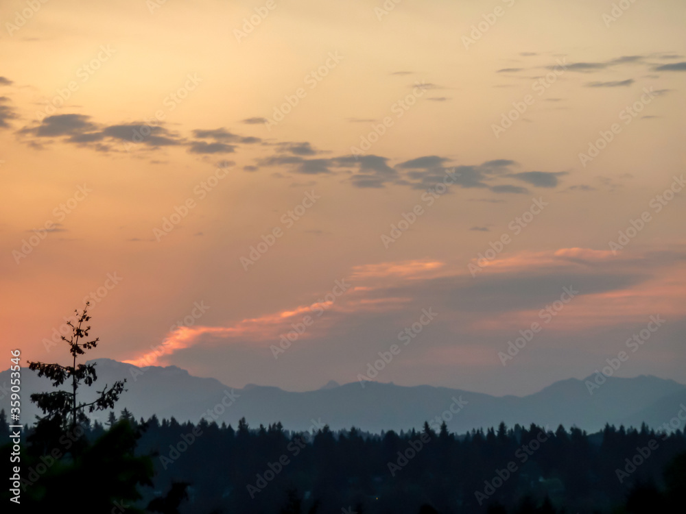 Silhouette of Cascade Range and forest during twilight hours on Mercer ...