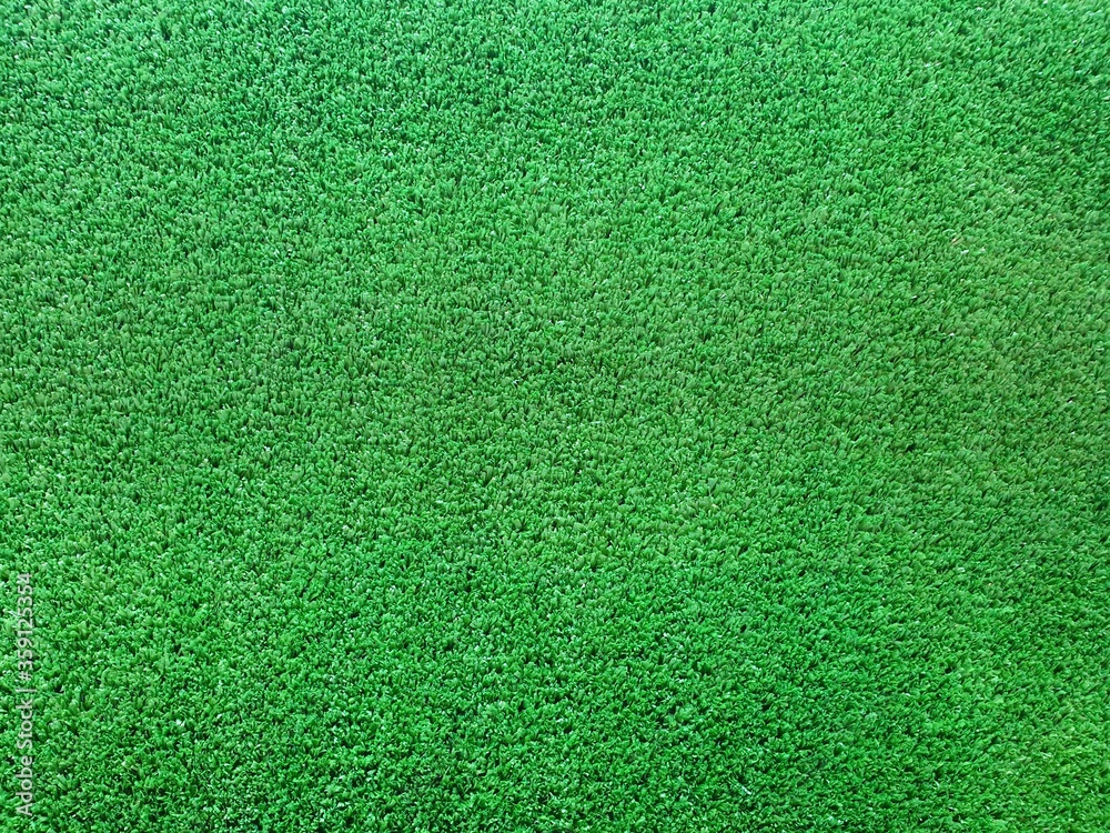 Artificial grass background with copy space.wallpaper for text and ...