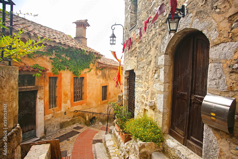 Inside the old streets of the beautiful hilltop medieval village of Eze ...