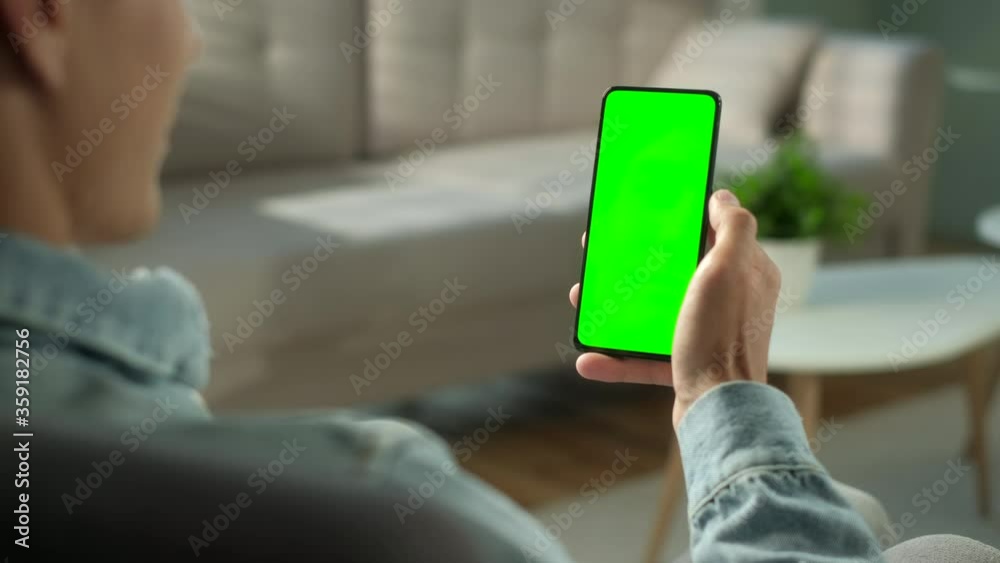 Back View of Woman at Phone with Green Screen for Copy Space. Chromakey ...