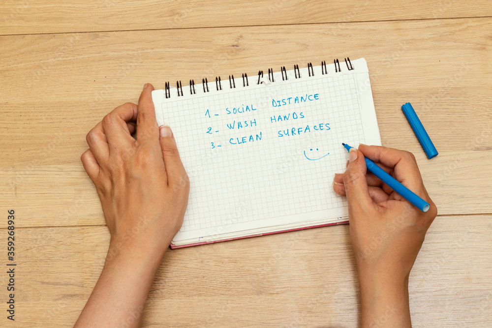 Coronavirus COVID-19 health safety guidelines. notebook with rules ...