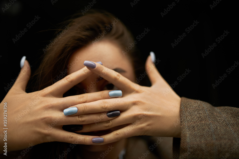 Close up image of unrecognizable dark haired young woman with long ...