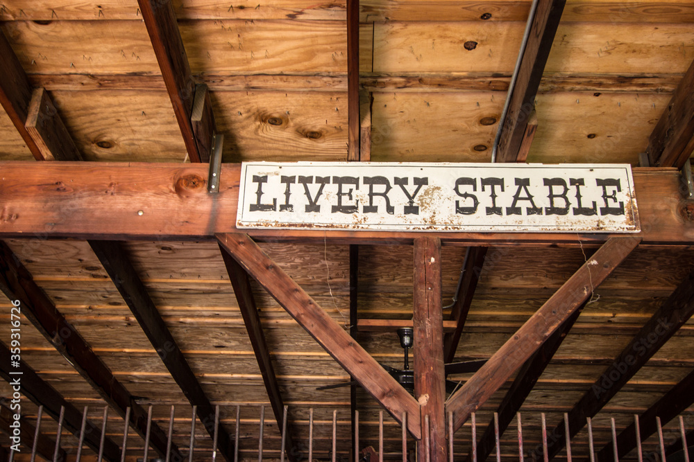 Livery Stable. Interior of barn with livery stable sign. Stock Photo ...