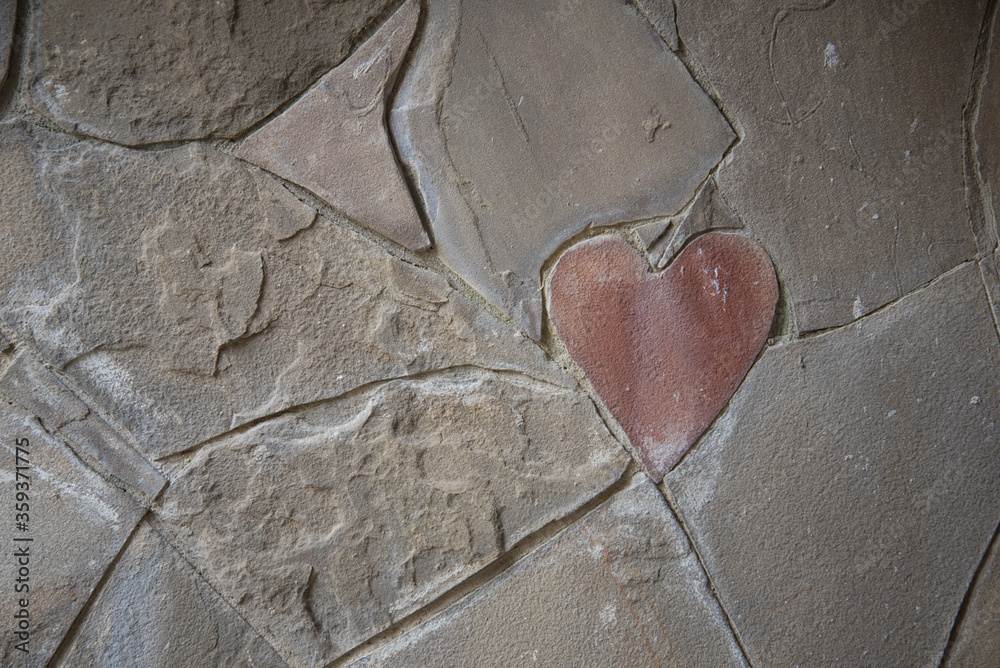 Stone wall cladding. Among the usual forms, there is a heart-shaped ...