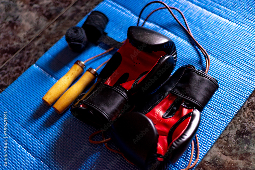 boxing gear ready to start training, black and red boxing gloves ...