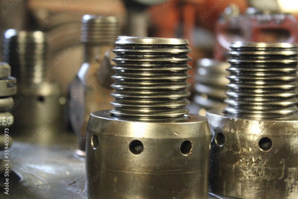 Foto de Cylinder Head bolts on a big industrial marine diesel engine on ...
