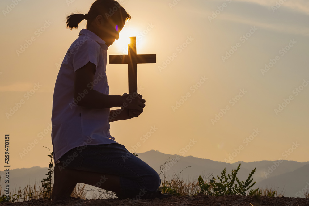 Christian, Christianity, Religion copy space background. Human kneeling ...