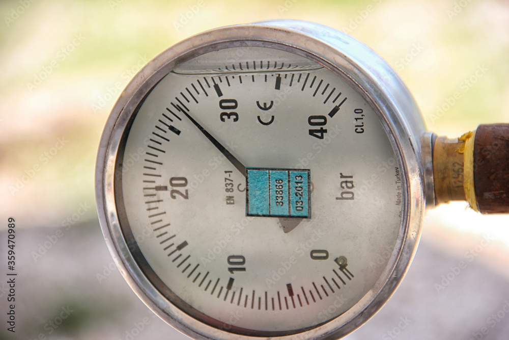 Hydrostatic testing and a manometer according to EN 837-1 Standard with ...