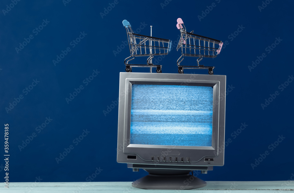 TV shop. Antenna old-fashioned retro tv with mini supermarket trolley ...