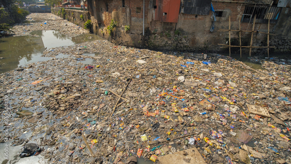 Dirty river in Dharavi slums. Mumbai. India. Stock Photo | Adobe Stock