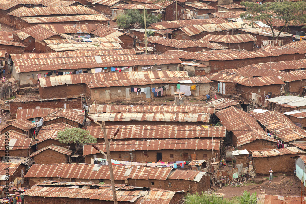 Corrgutead metal roofs and crumbling walls makeup crowded and dirty ...