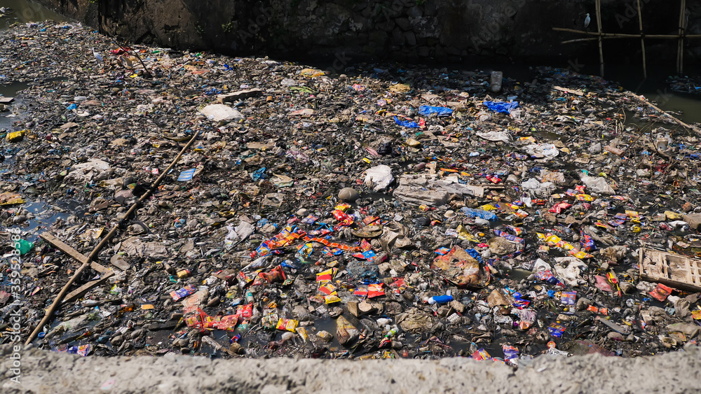 Dirty river in Dharavi slums. Mumbai. India. Stock Photo | Adobe Stock