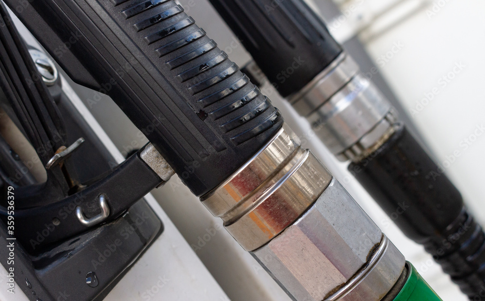 Refueling guns. Handles with refueling gun couplings. Stock Photo ...