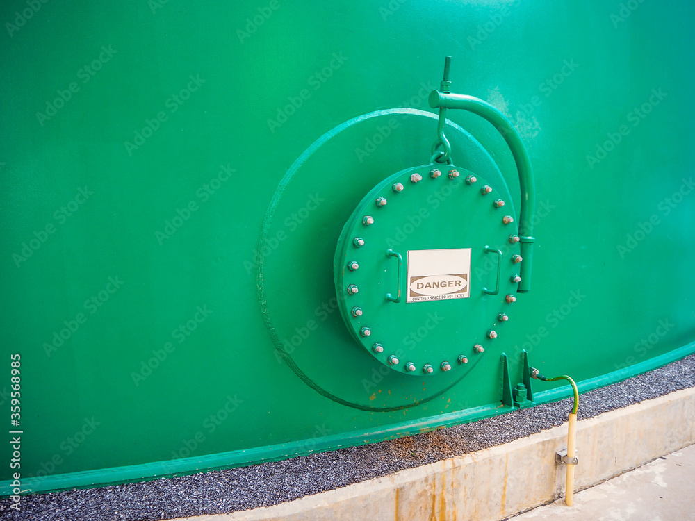 Manhole of water tank in power plant. Stock Photo | Adobe Stock