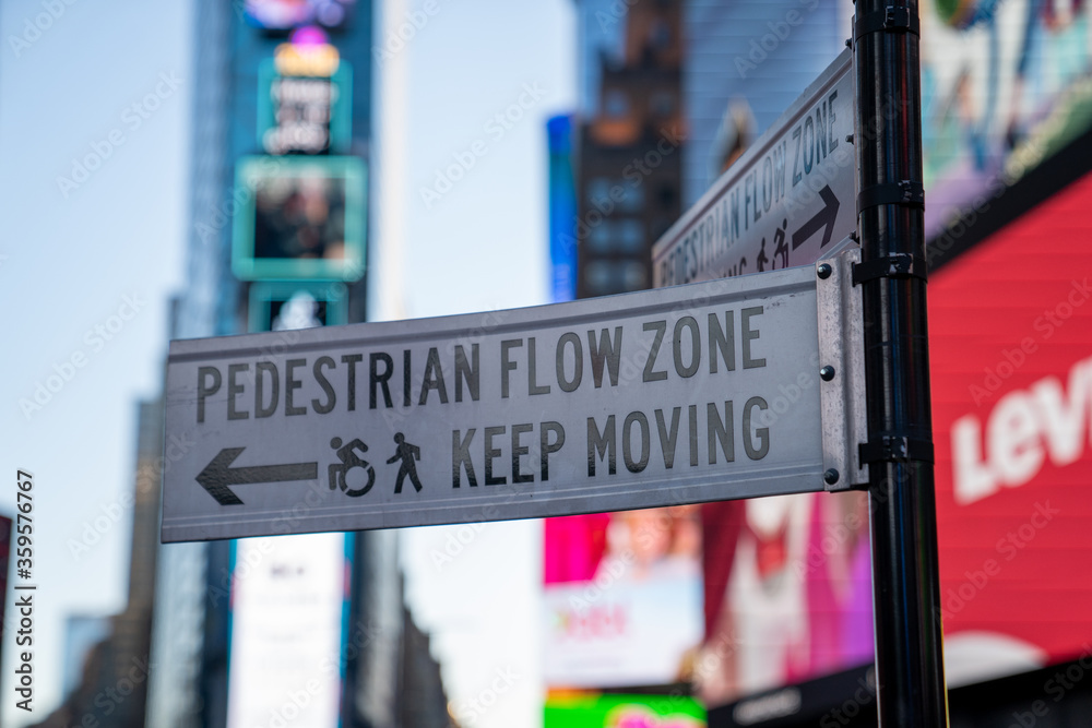 NYC pedestrian street signs in Times Square. Stock Photo | Adobe Stock