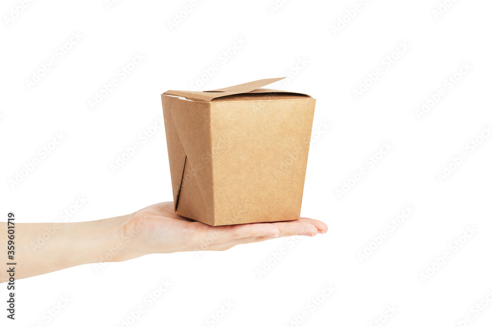 Empty square cardboard box made of kraft material on hand on isolate ...