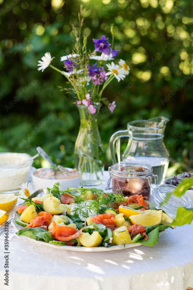 Scandinavian salmon salad on a typical midsummer solstice traditional ...