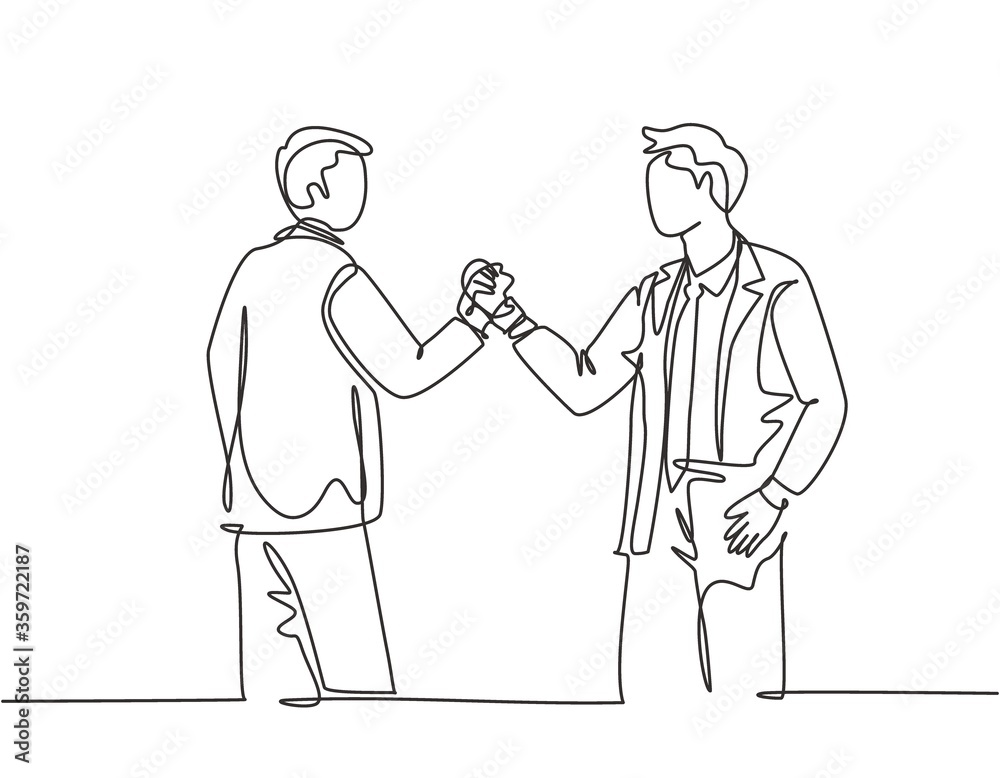 One single line drawing of two young happy business men holding their ...