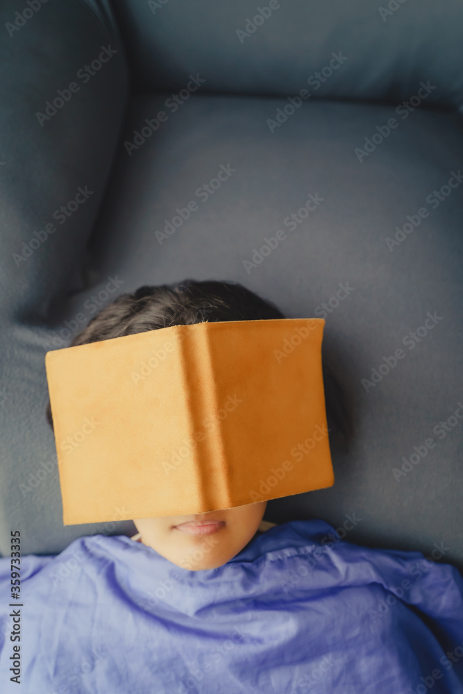 Young Asian Woman Relaxing and Fall Asleep While Reading Book on Sofa ...