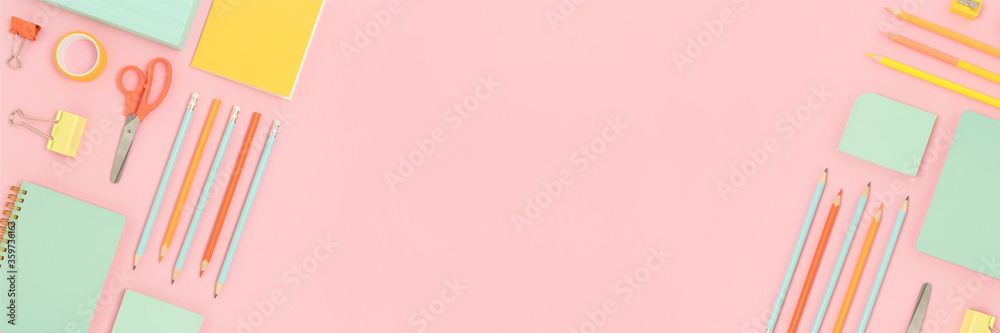 Colorful school supplies frame on a pink pastel background. Banner with ...