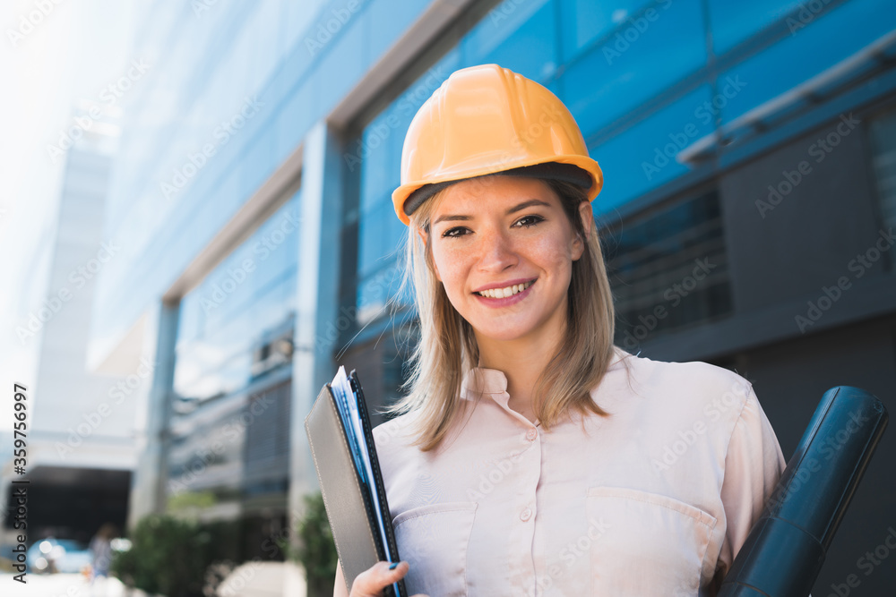 Professional architect woman standing outdoors. Stock Photo | Adobe Stock