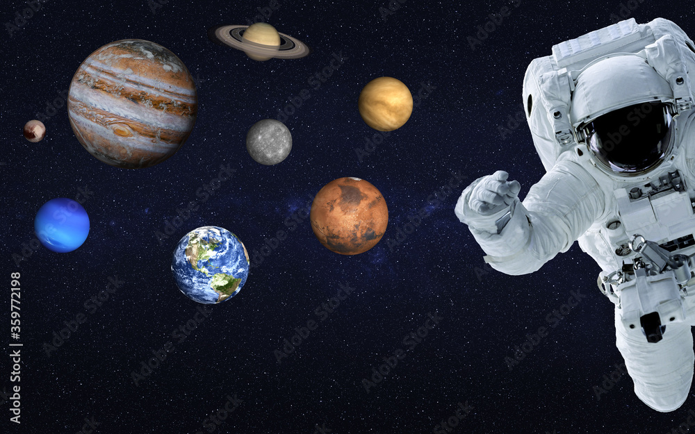 Astronaut near Planets of solar system together in space. Earth, Mars ...