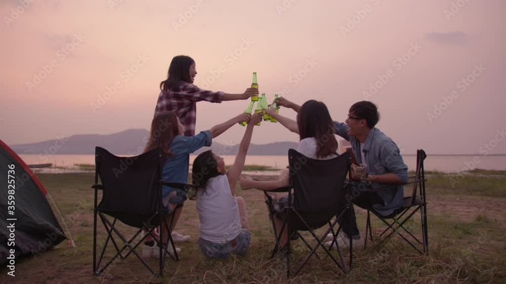 Full body shot : Young happy friends drinking beer and having fun at ...
