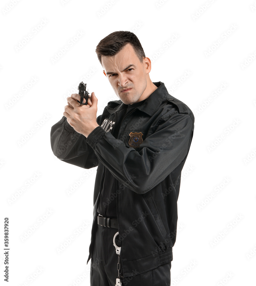 Aggressive police officer with gun on white background Stock Photo ...