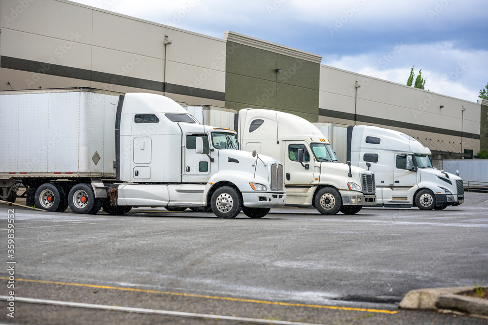 Poster Different models of big rigs semi trucks with dry van semi ...