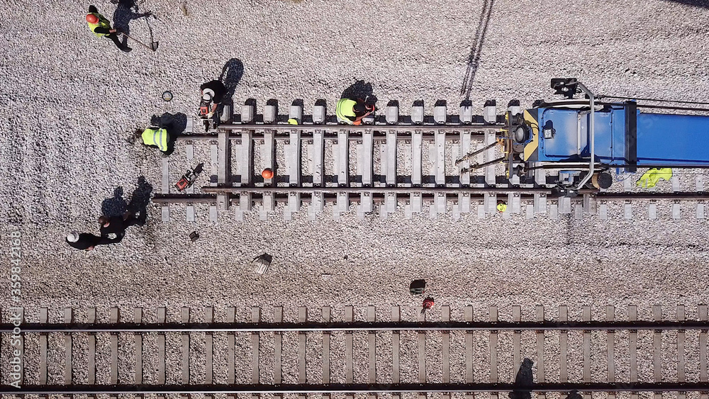 Railroad workers repairing a broken track. Repairing railway. Rail ...
