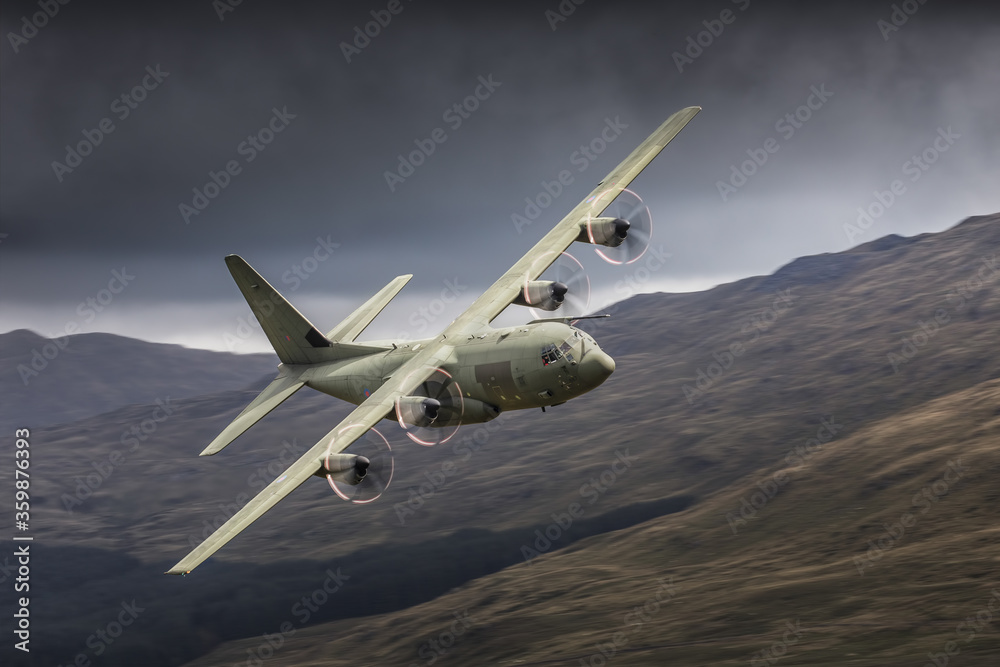Royal Air Force (RAF) Lockheed C-130 Hercules flying Low Level in the ...