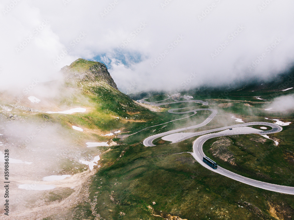 Bird's eye view of serpentine curves. Aerial view of scenic route in ...